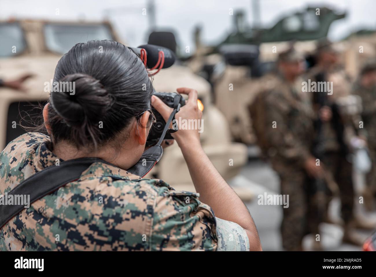U.S. Marine Corps Cpl. Alpha Hernandez, a combat videographer with 3rd ...