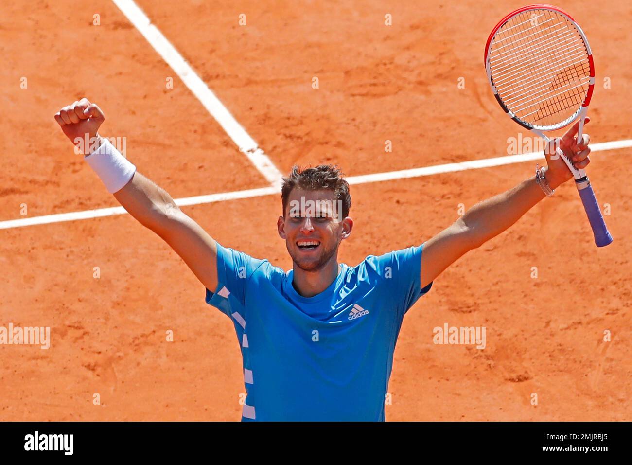 Austria's Dominic Thiem celebrates winning his semifinal match of the ...