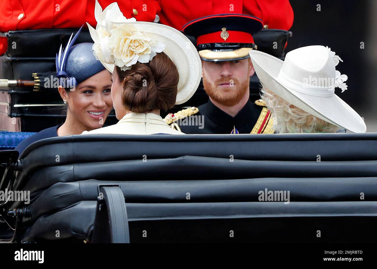 Britain's Camilla, the Duchess of Cornwall, right, Kate, the Duchess of ...