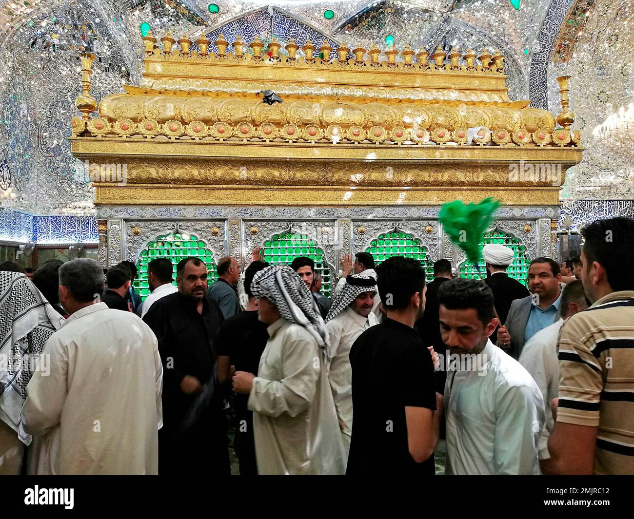 Shiite Muslim worshippers pray inside the holy shrine of Imam Ali, the ...