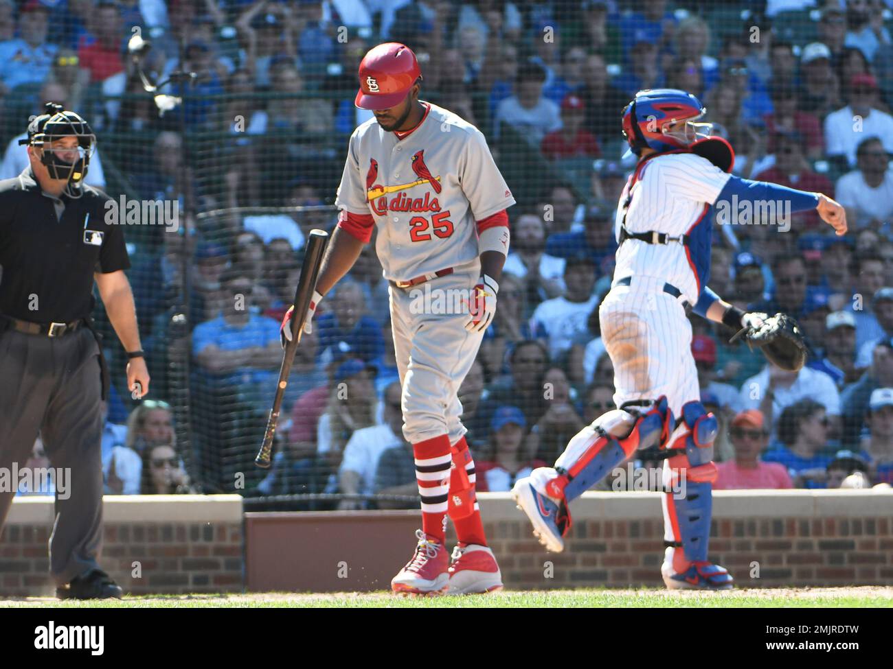 St. Louis Cardinals' Dexter Fowler (25) walks back to the dugout after ...