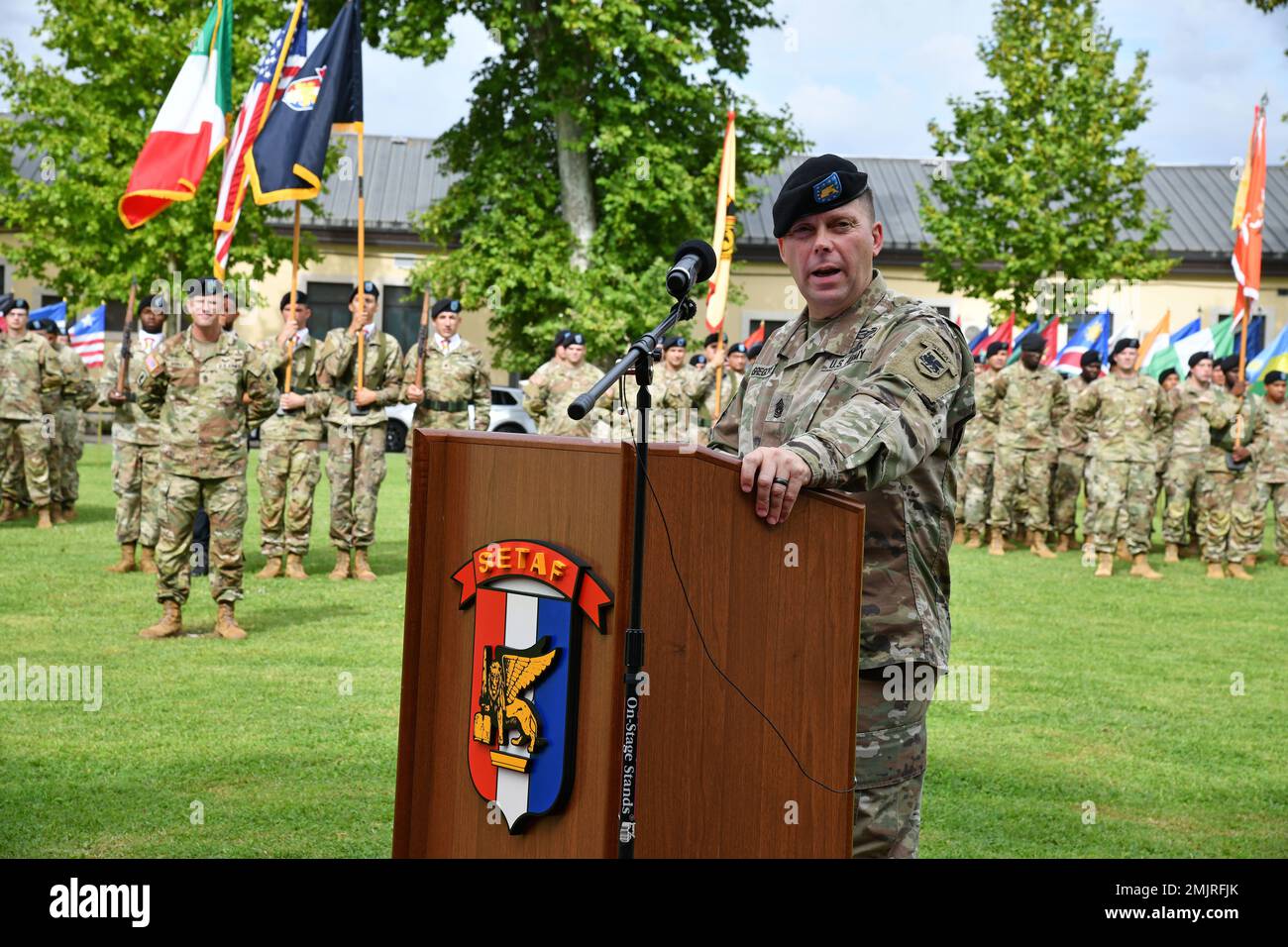 Command Sergeant Major Charles W. Gregory, Jr., the outgoing Command Sgt. Maj., delivers his ...
