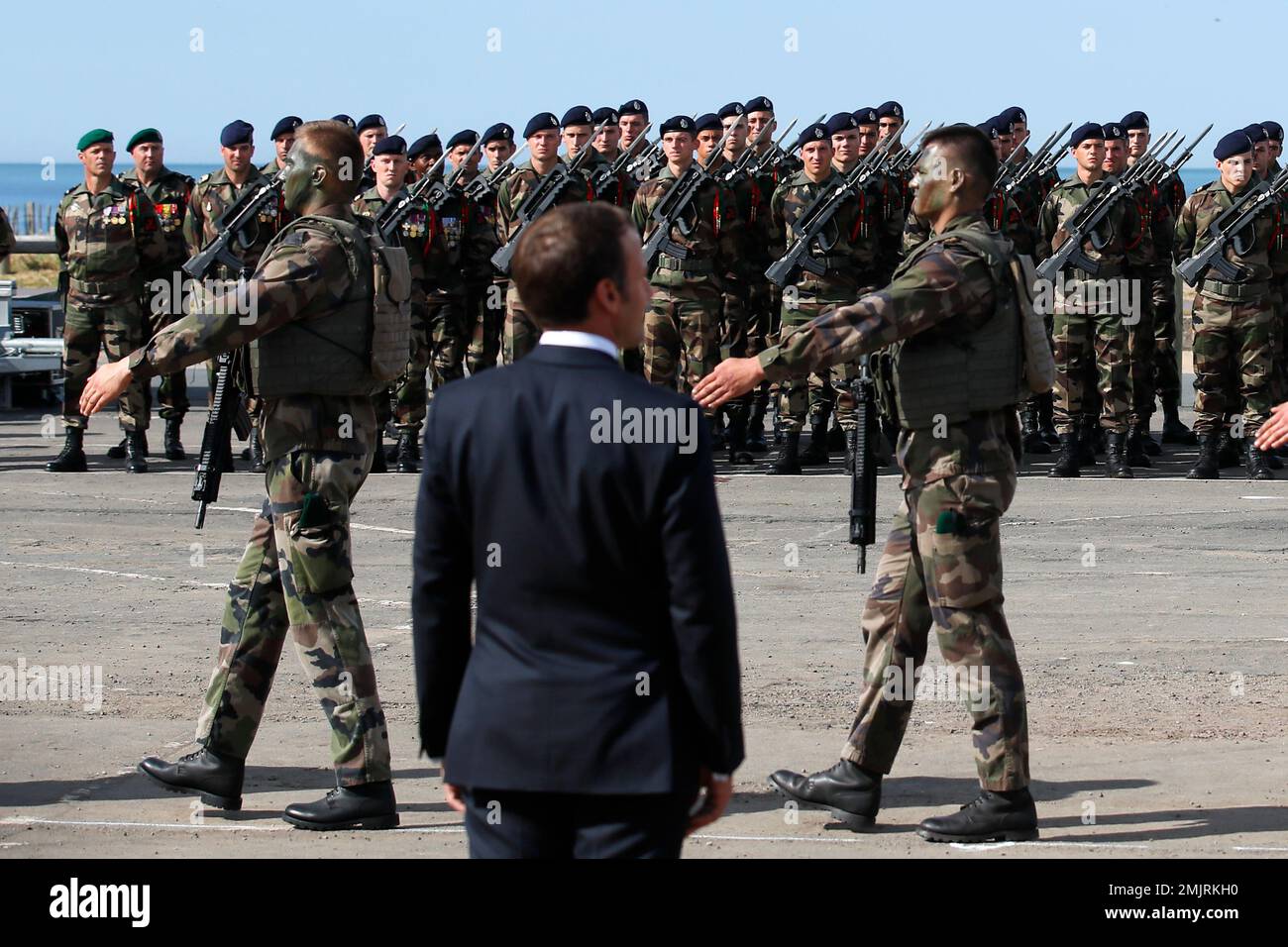 French President Emmanuel Macron watch French soldiers parading during ...