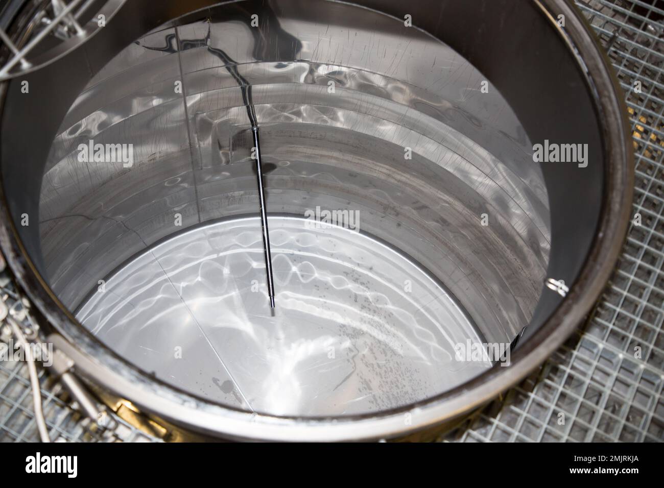 Modern empty winery big steel barrels Stock Photo - Alamy