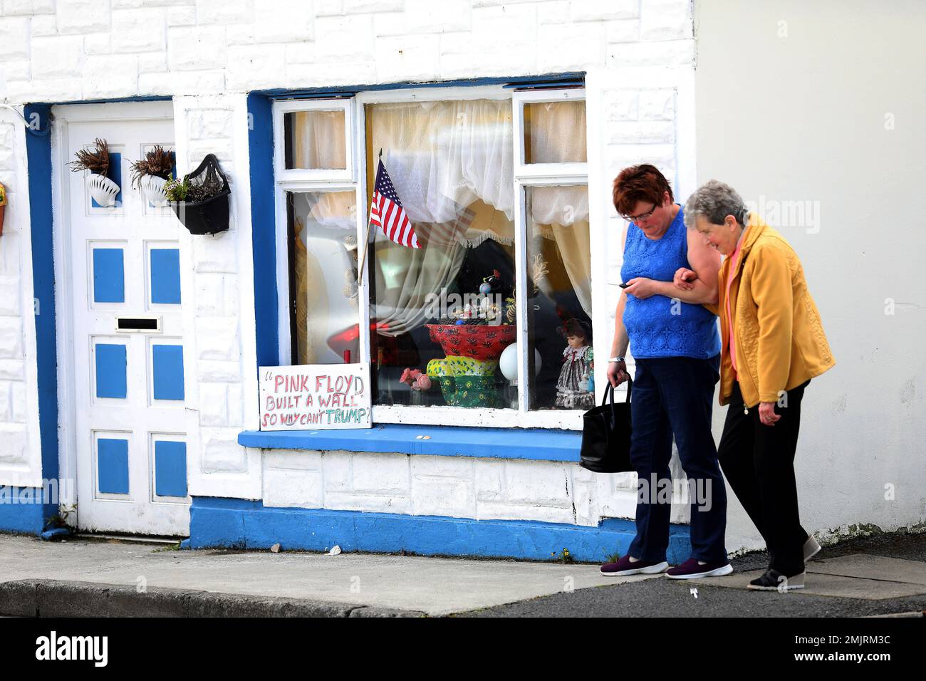 A pro Trump sign is seen in the window of a house in the town of ...