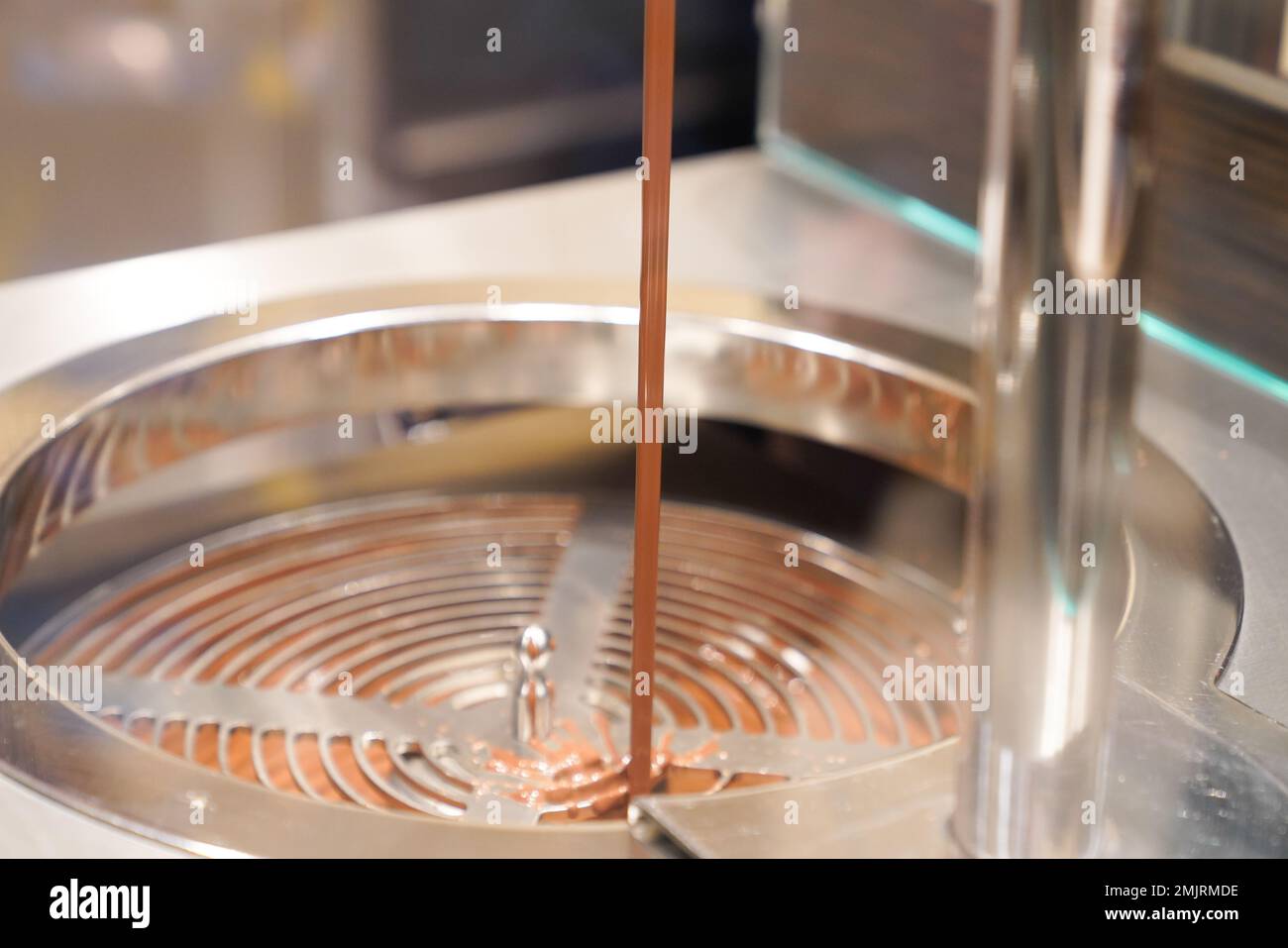 Melted chocolate dripping hi-res stock photography and images - Alamy
