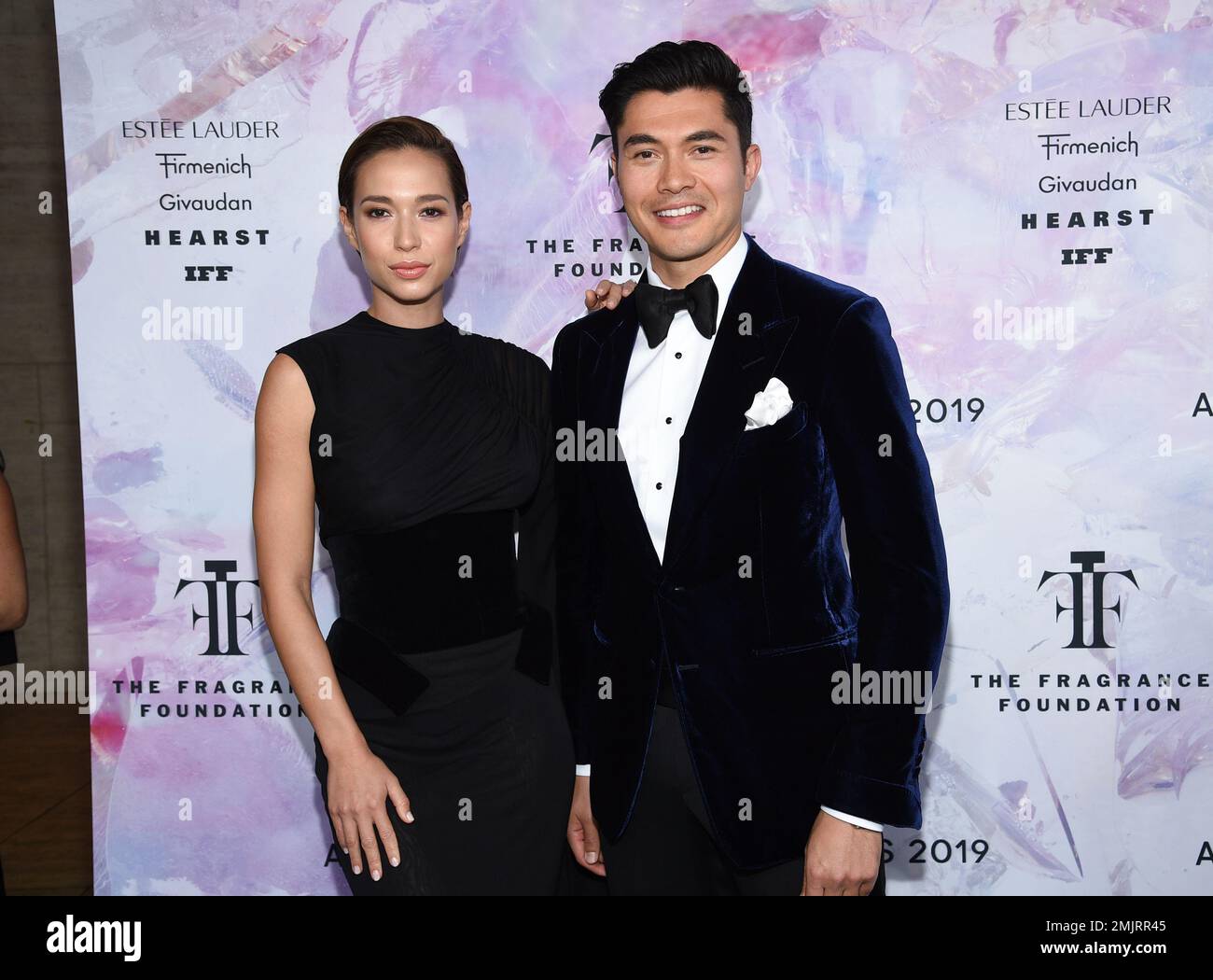 Actor Henry Golding and wife Liv Lo attend the Fragrance Foundation ...