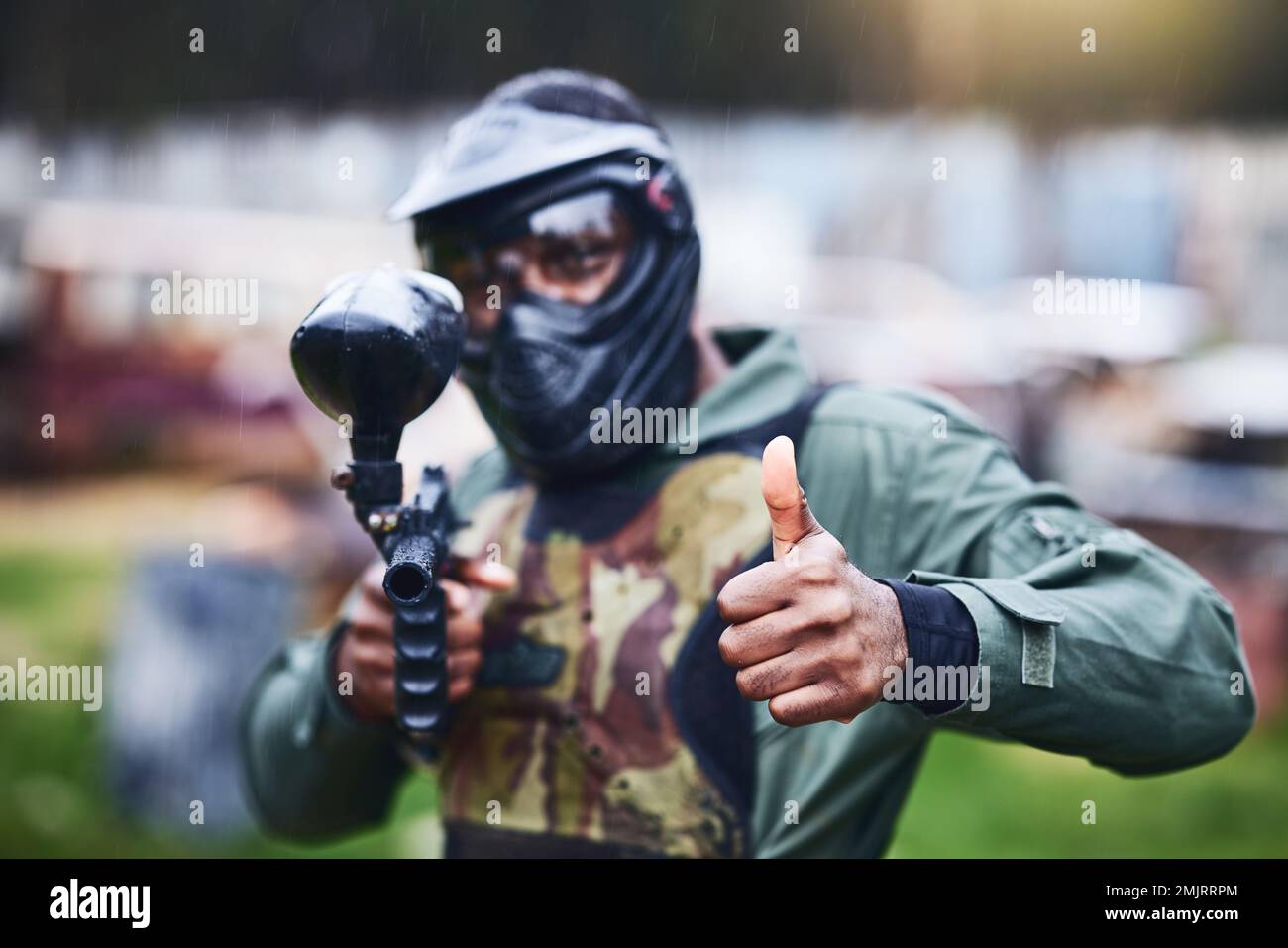 Paintball gun, man and portrait with mask, camouflage clothes and ...