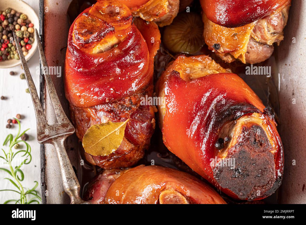 Hot ham hock as regional dish in Bavaria. Schweinshaxe with ingredients ...