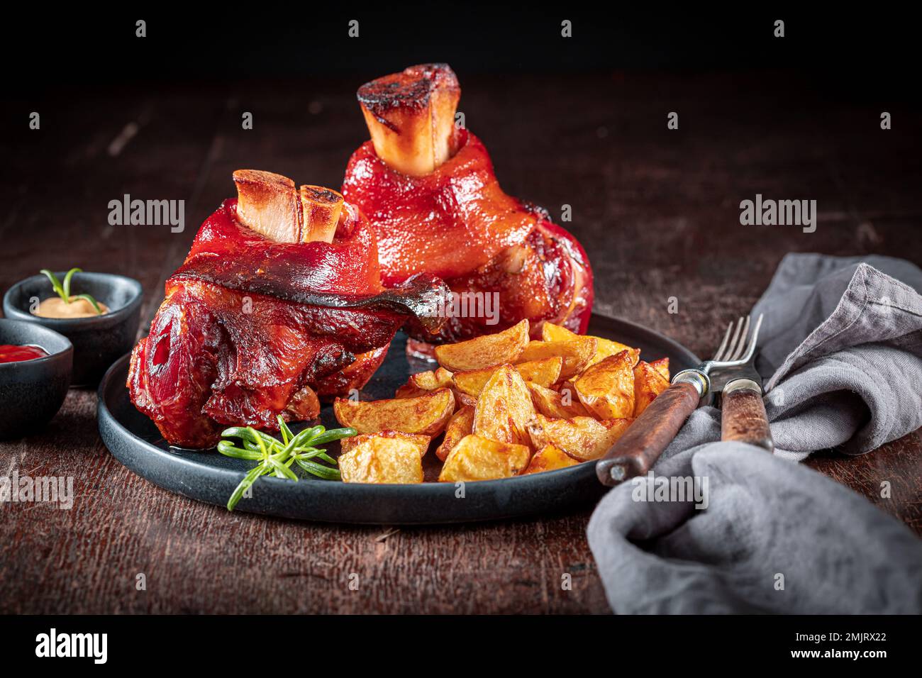 Homemade roasted pork knuckle served with mustard on plate. Roasted ... Homemade roasted pork knuckle served with mustard on plate. Roasted ...