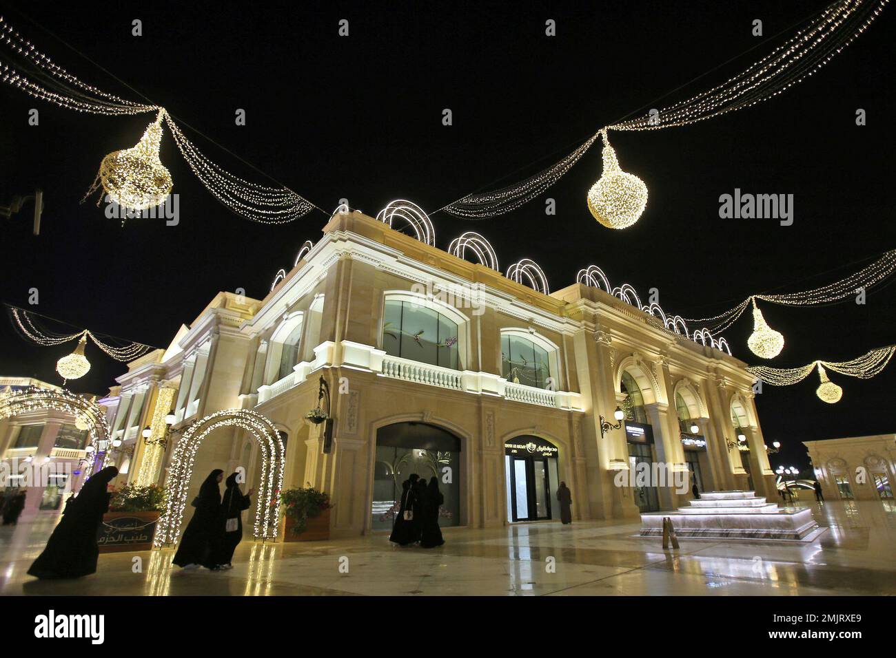 In this Wednesday, April 24, 2019 photo, women walk through the Al Hazm ...
