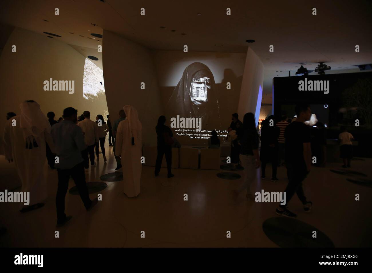 In this Monday, April 22, 2019 photo, people visit a gallery displaying ...