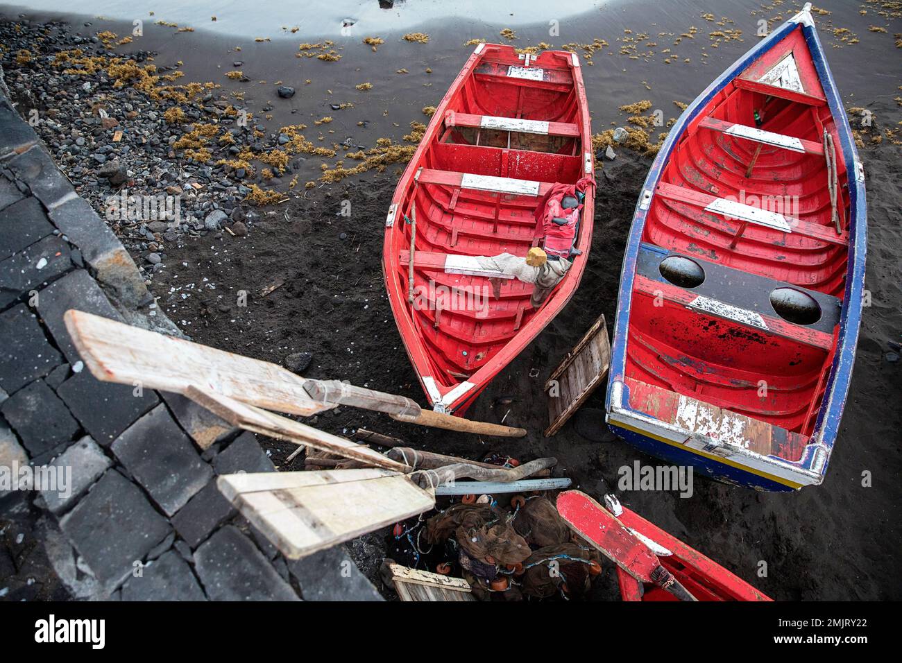 Traditional fishing wooden boats at the beach in Cidade Velha, Santiago ...