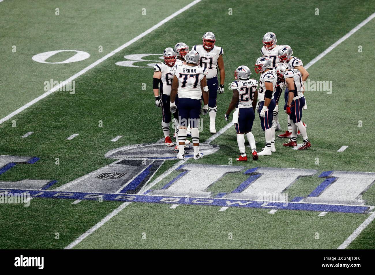 The New England Patriots wait for play to resume while facing the Los ...