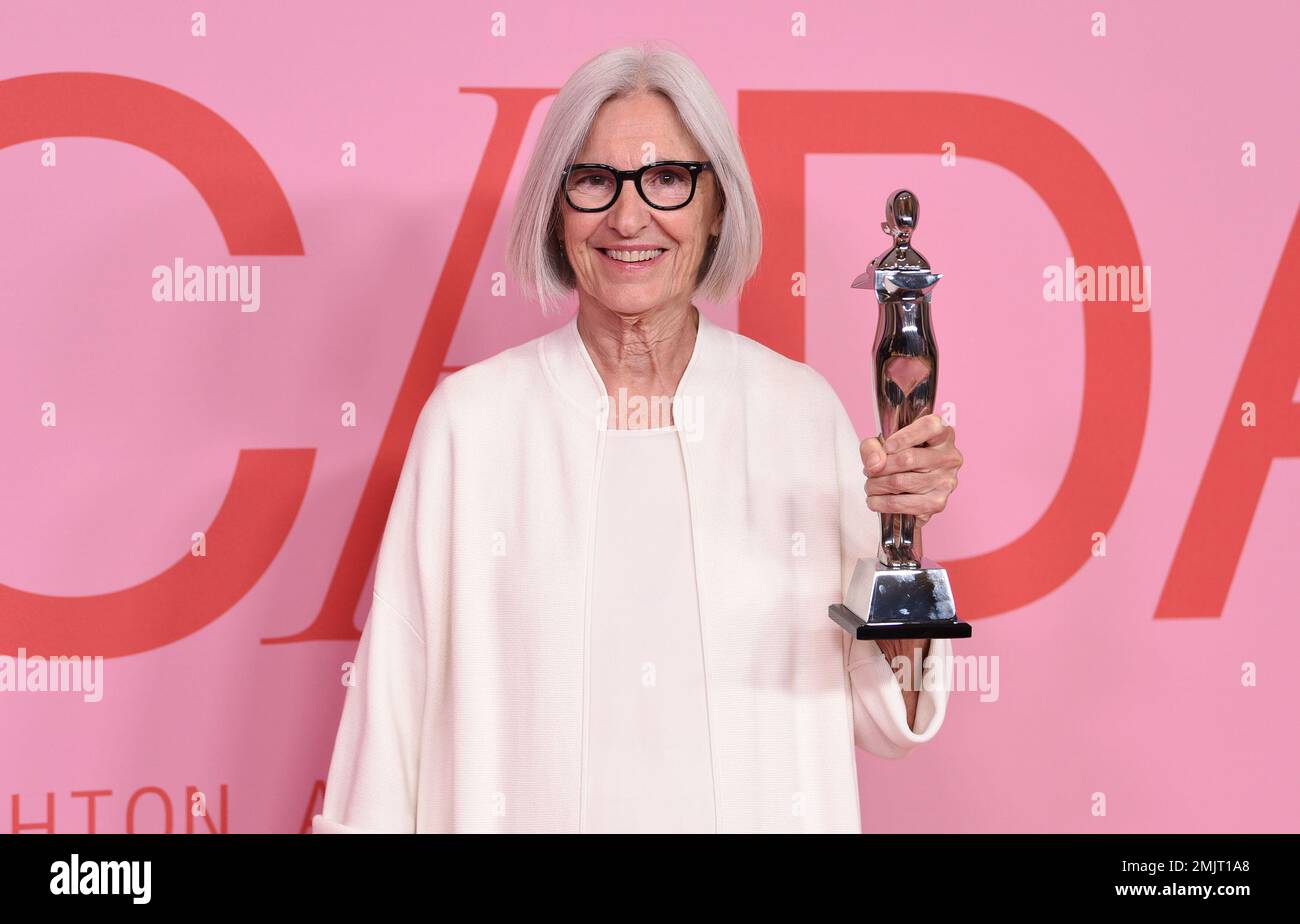 Fashion designer Eileen Fisher poses with the positive change award at ...
