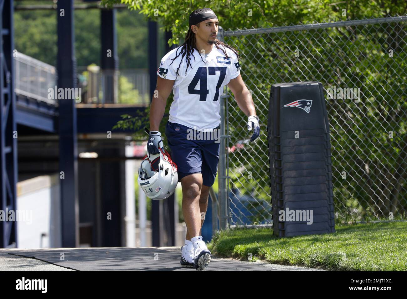New England Patriots Jakob Johnson steps on the field at the start of ...