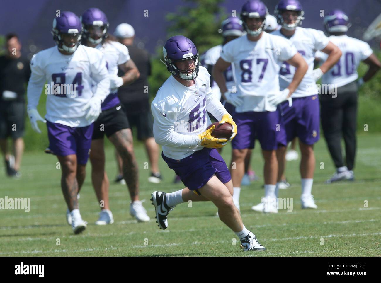 Minnesota Vikings tight end Kyle Rudolph, center, makes a cut on a pass ...