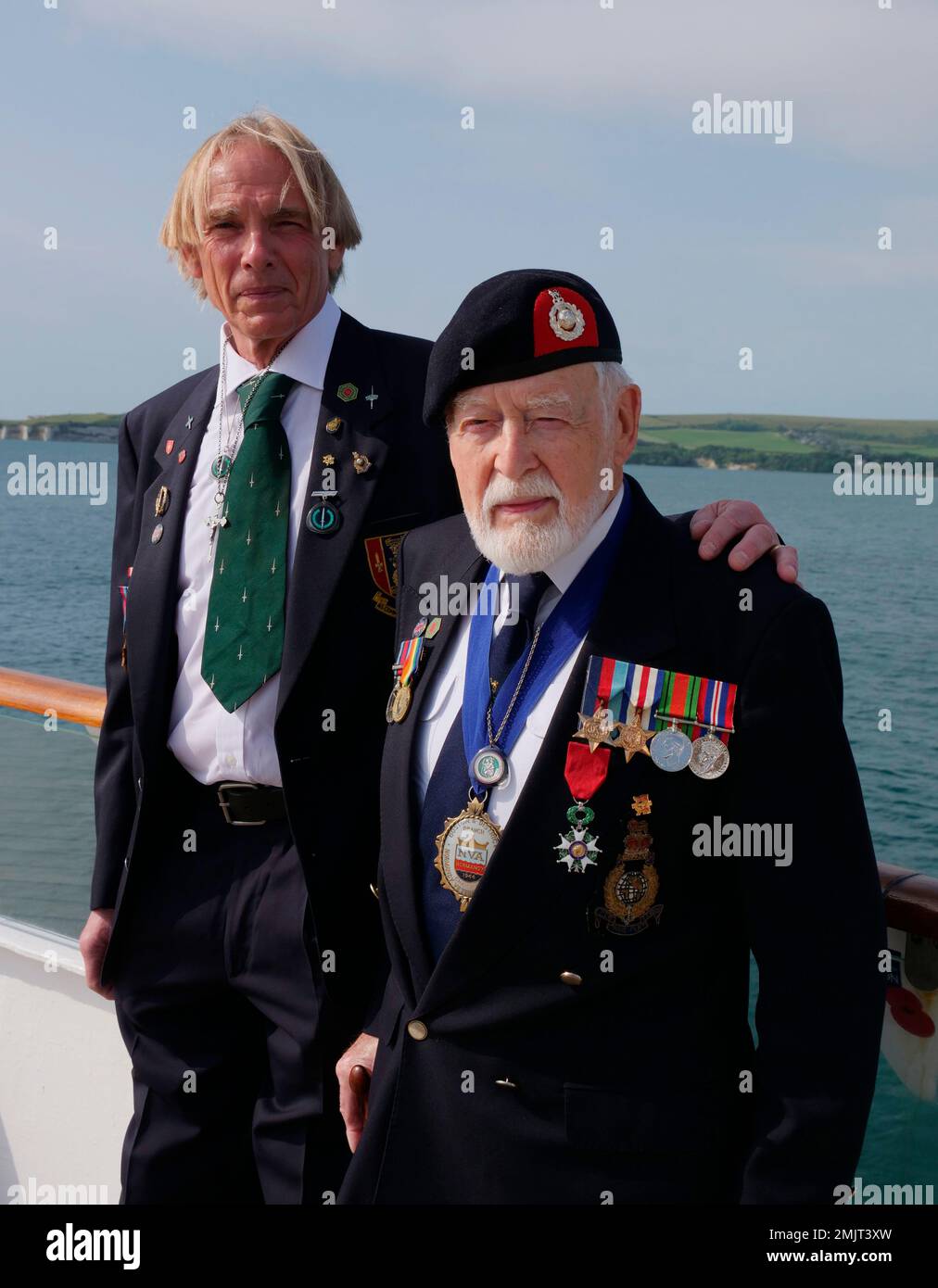 Former Royal Marine Les Budding, right, stands with Philip Collins, 62 ...