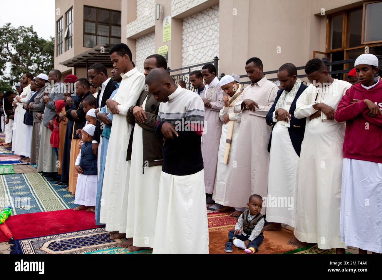 Kenyan Muslims stand for prayers outside Masjid As Salaam during the ...