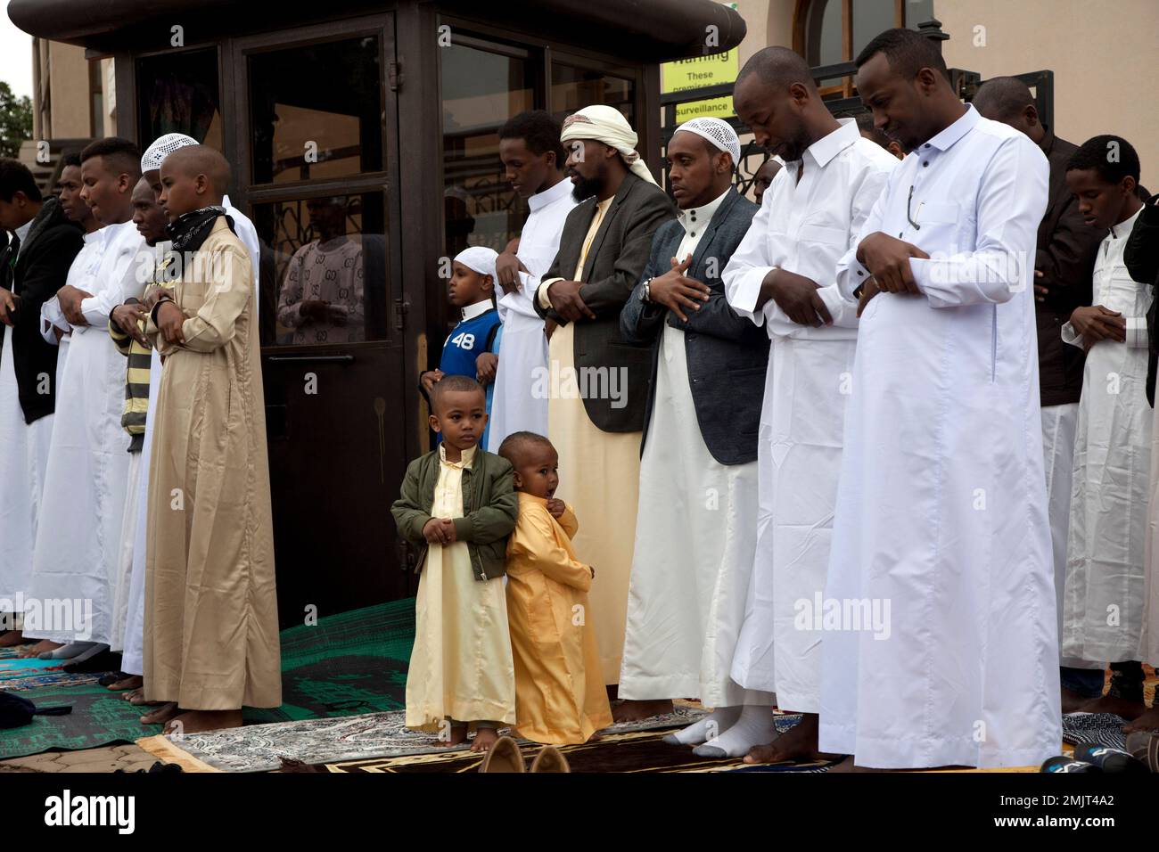 Kenyan Muslims stand for prayers outside Masjid As Salaam during the ...