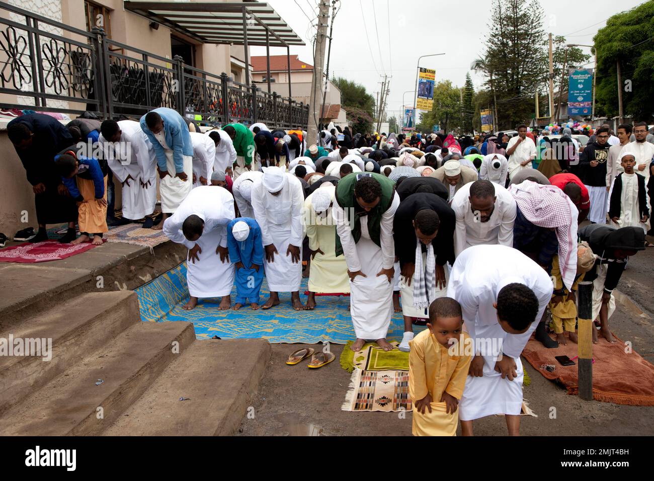 Kenyan Muslims stand for prayers outside Masjid As Salaam during the ...