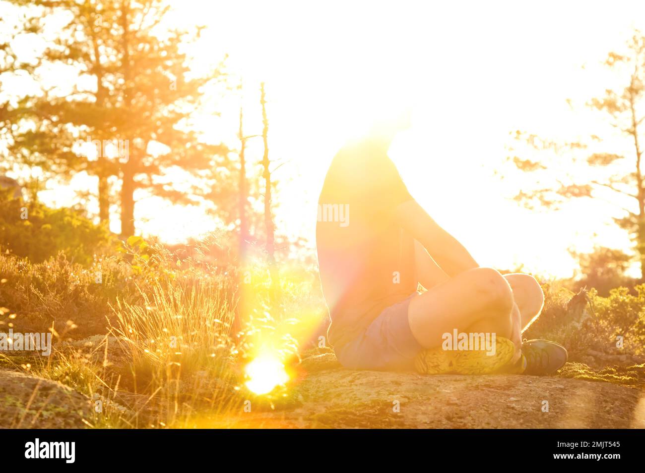 Man grass sunlight hi-res stock photography and images - Alamy