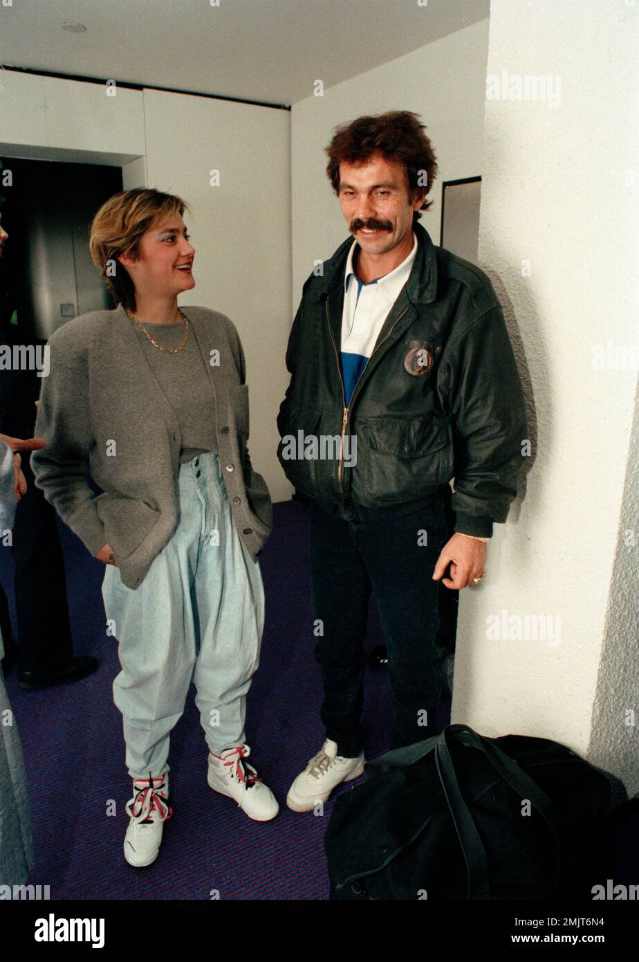 Romanian gymnast Nadia Comaneci laughs with friend Constantin Panit at ...