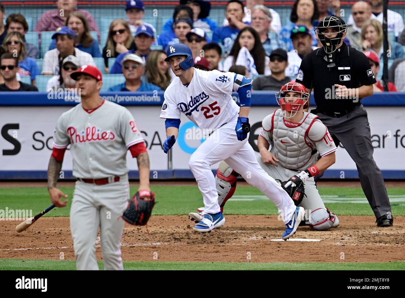 Los Angeles Dodgers' David Freese, second from left, runs to first as ...