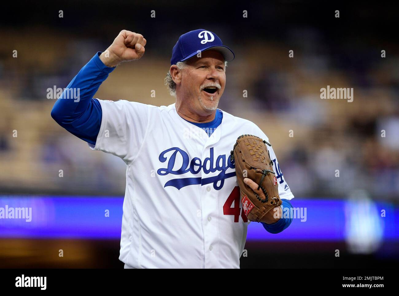 Former Los Angeles Dodgers pitcher Kevin Gross celebrates an out during ...