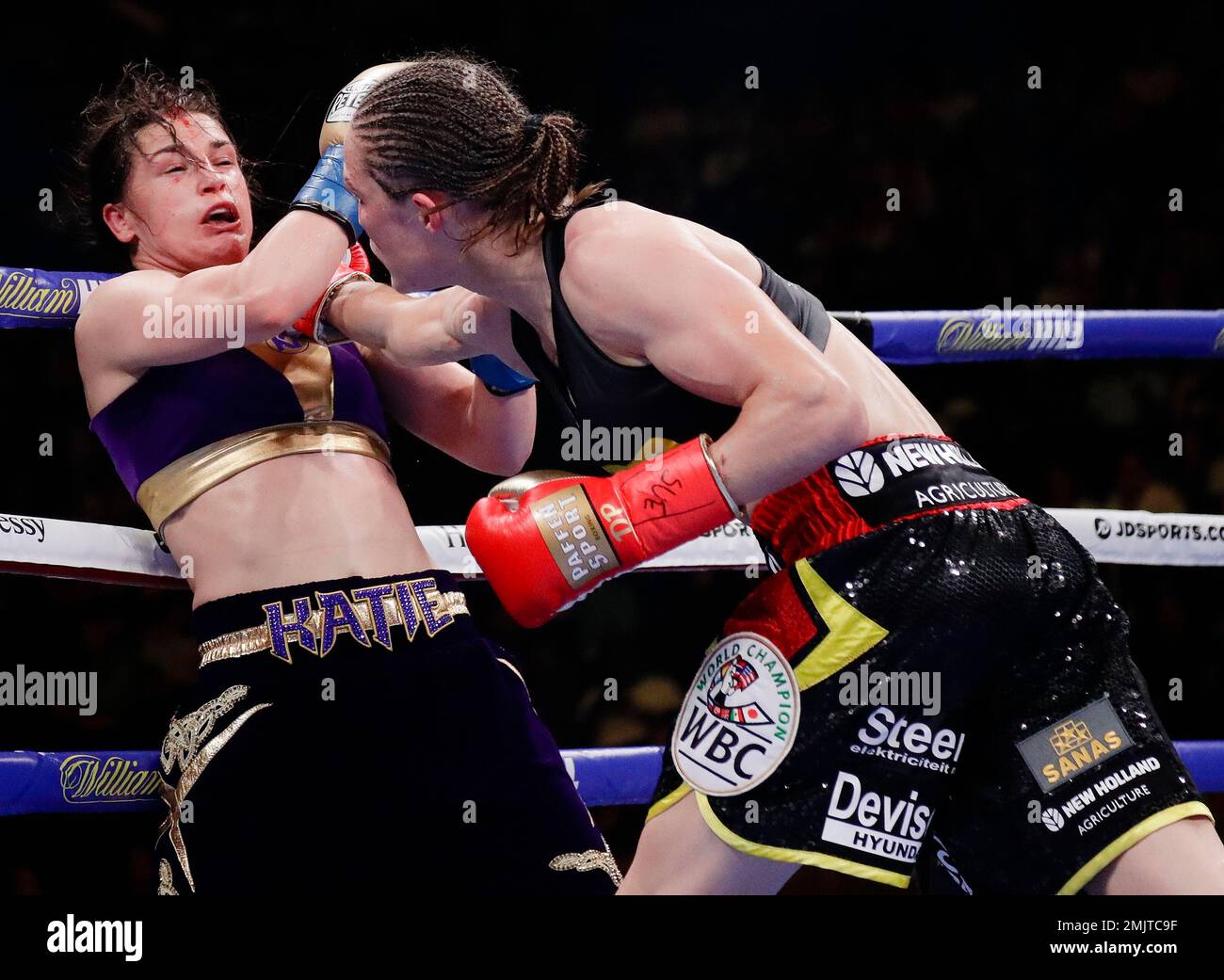 Delfine Persoon, of Belgium, punches Ireland's Katie Taylor during the ...