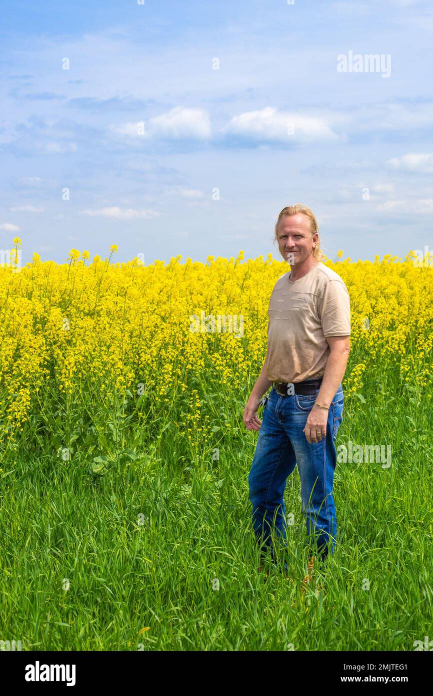 Farmer rapeseed plant on field hi-res stock photography and images - Alamy