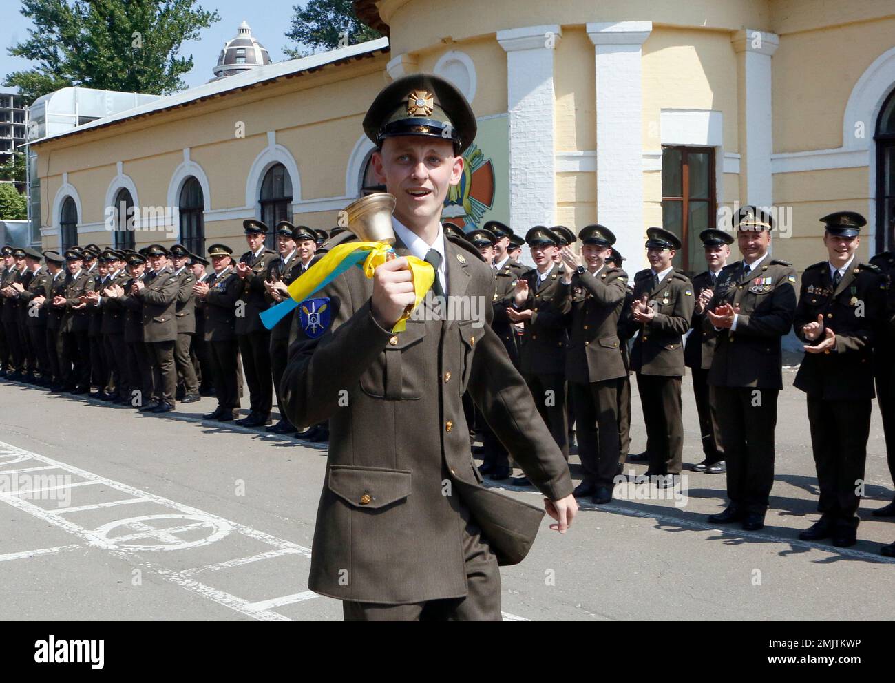 A cadet rings a symbolic bell during a graduation ceremony at the ...