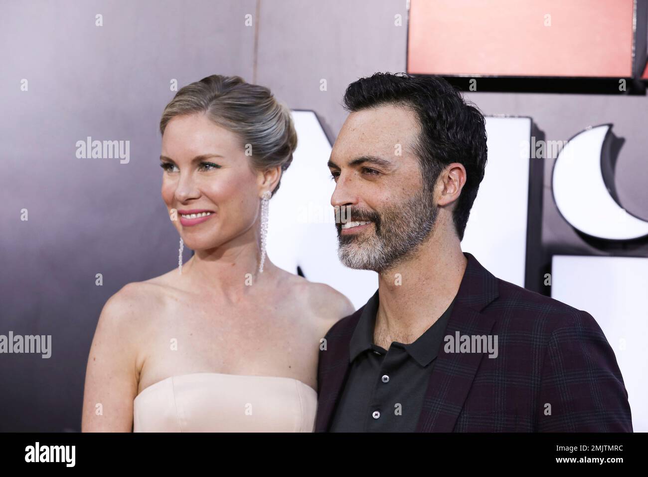 Elspeth Keller, from left, and Reid Scott attend the premiere of "Late ...