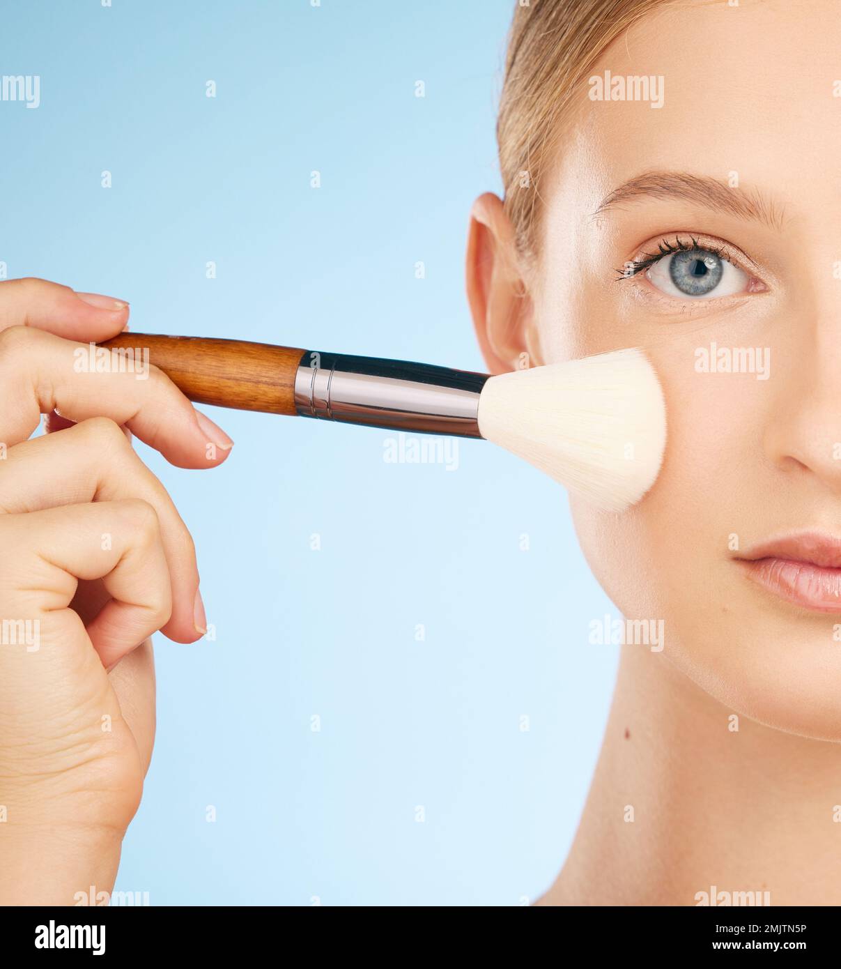 Woman, studio portrait and makeup brush for cosmetics, foundation or ...