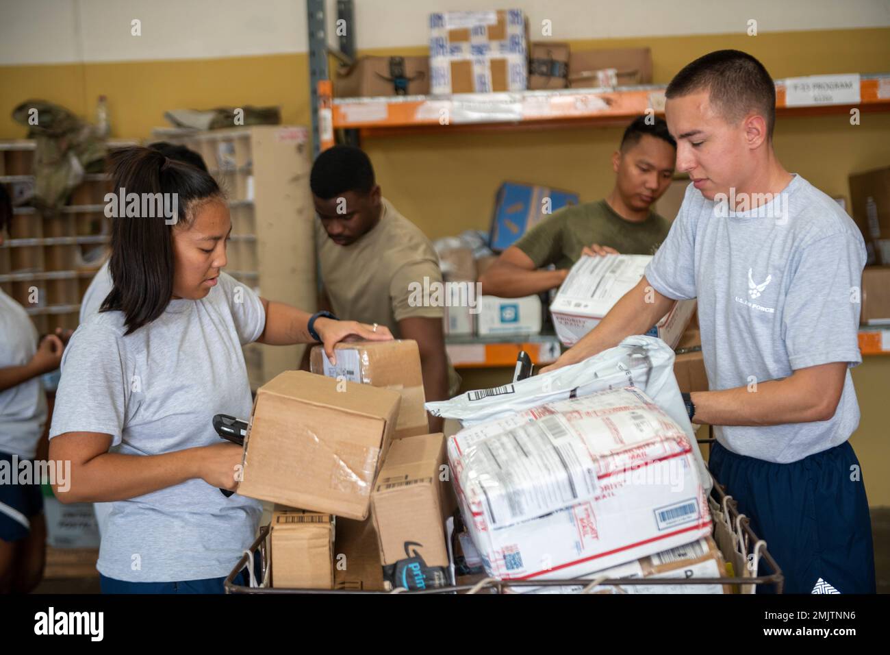 U.S. Air Force military postal clerks from the 379th Expeditionary ...