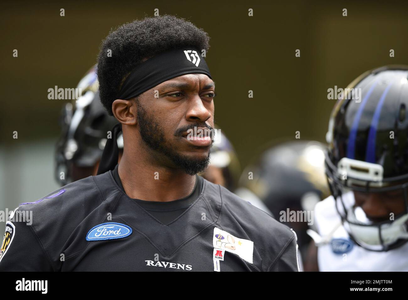 Baltimore Ravens' Robert Griffin III awaits the start of a NFL football ...
