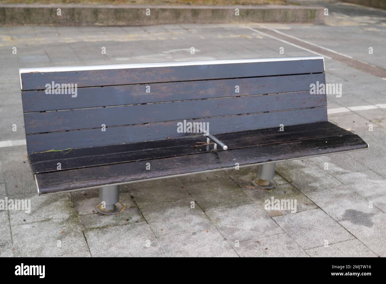 timber metal bench seat with center arm rests on hostile design ...