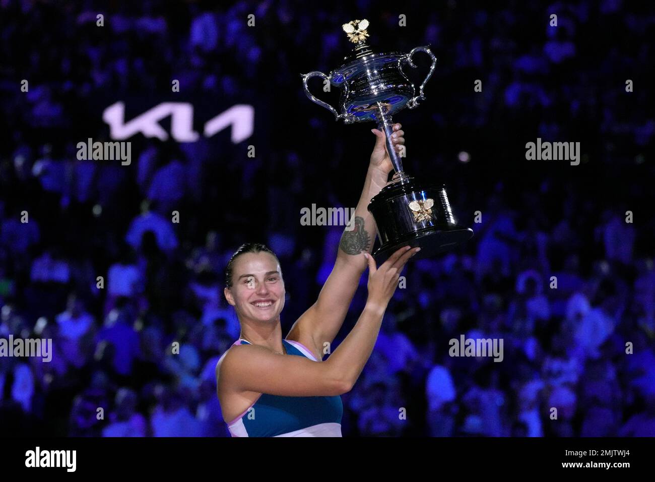 Aryna Sabalenka of Belarus holds the Daphne Akhurst Memorial Trophy aloft after defeating Elena ...