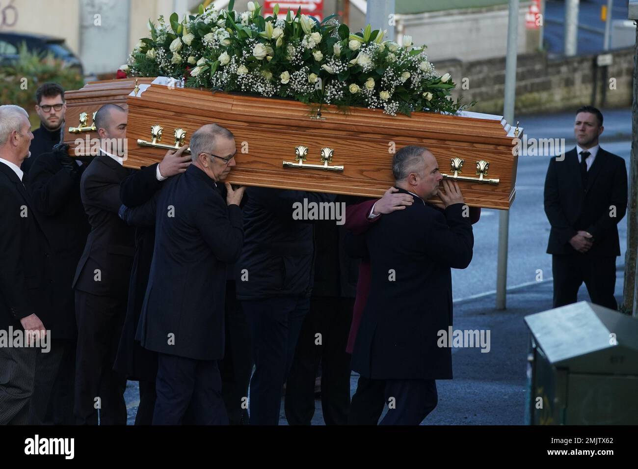 The coffins of Alex and Ann Easton arrive for a Service of Thanksgiving ...