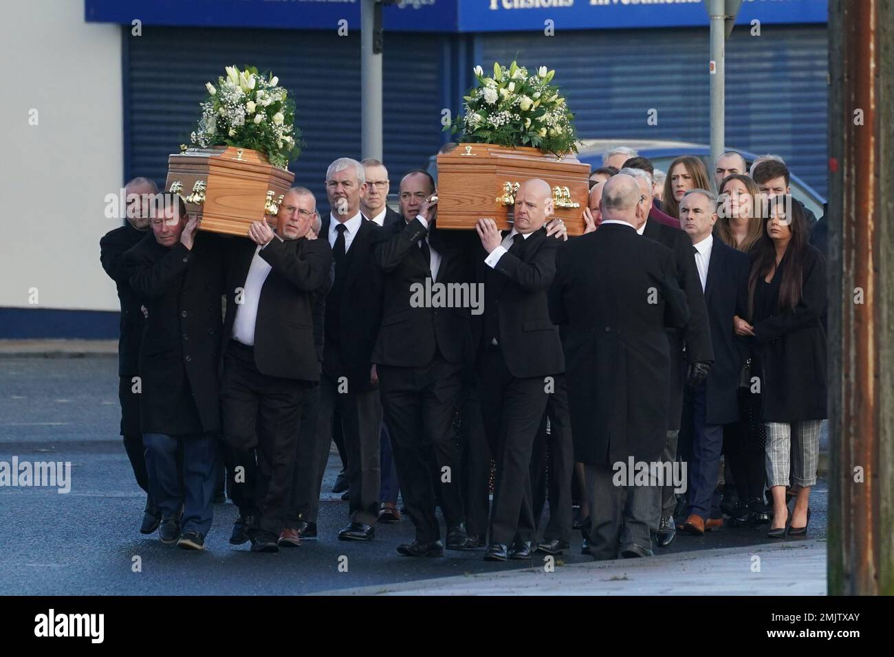 The coffins of Alex and Ann Easton arrive for a Service of Thanksgiving ...