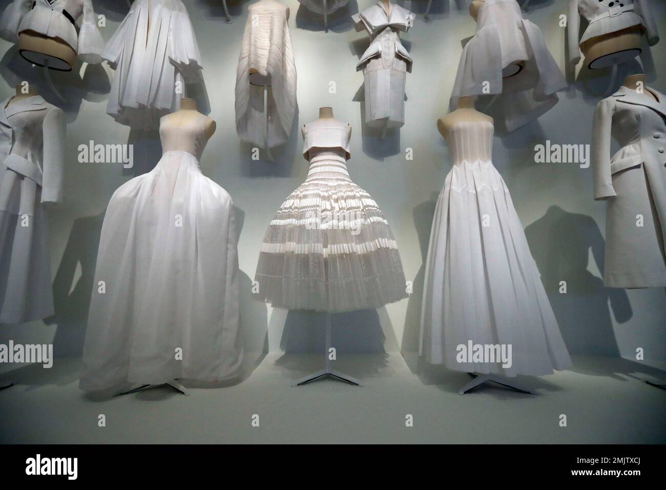 The early creation process of Christian Dior dresses that are part of ...