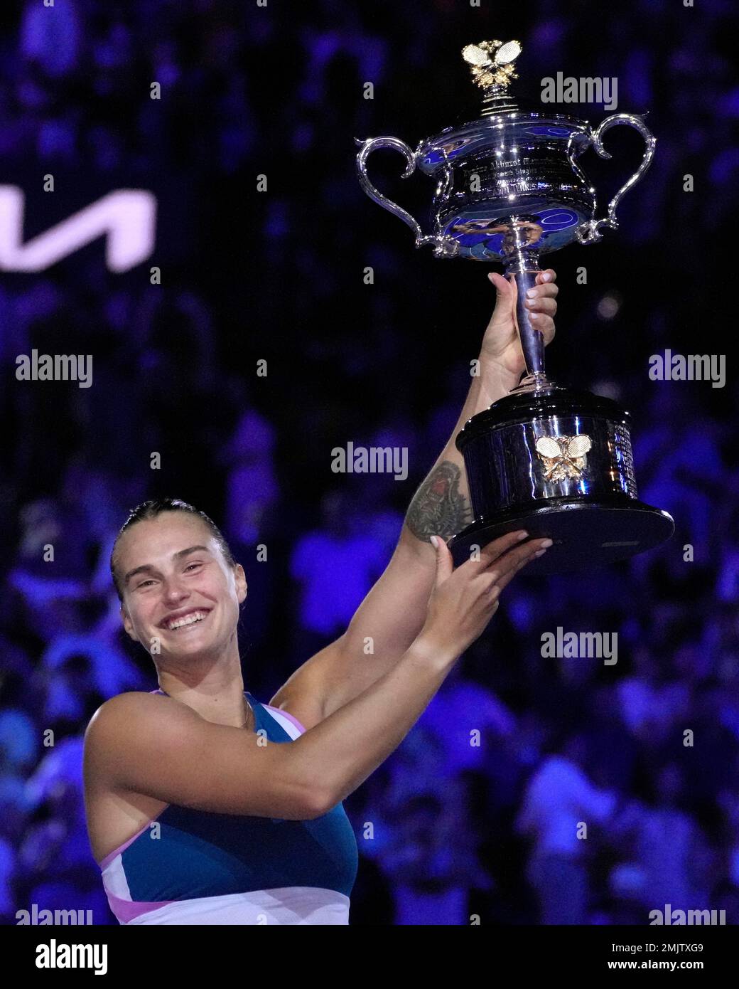 Aryna Sabalenka of Belarus holds the Daphne Akhurst Memorial Trophy aloft after defeating Elena ...