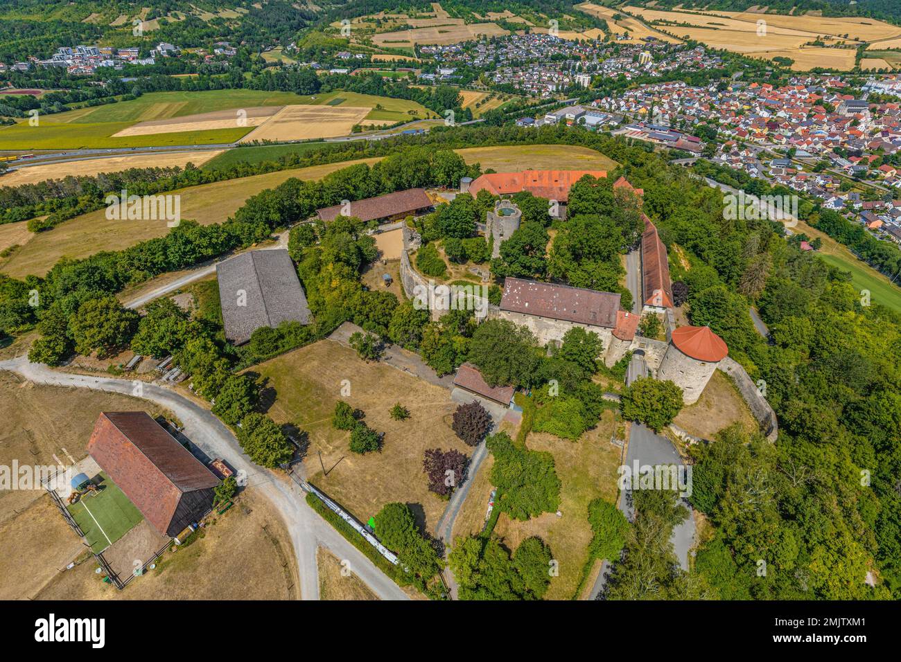Aerial view to the idyllic region around Igersheim in the Tauber valley ...