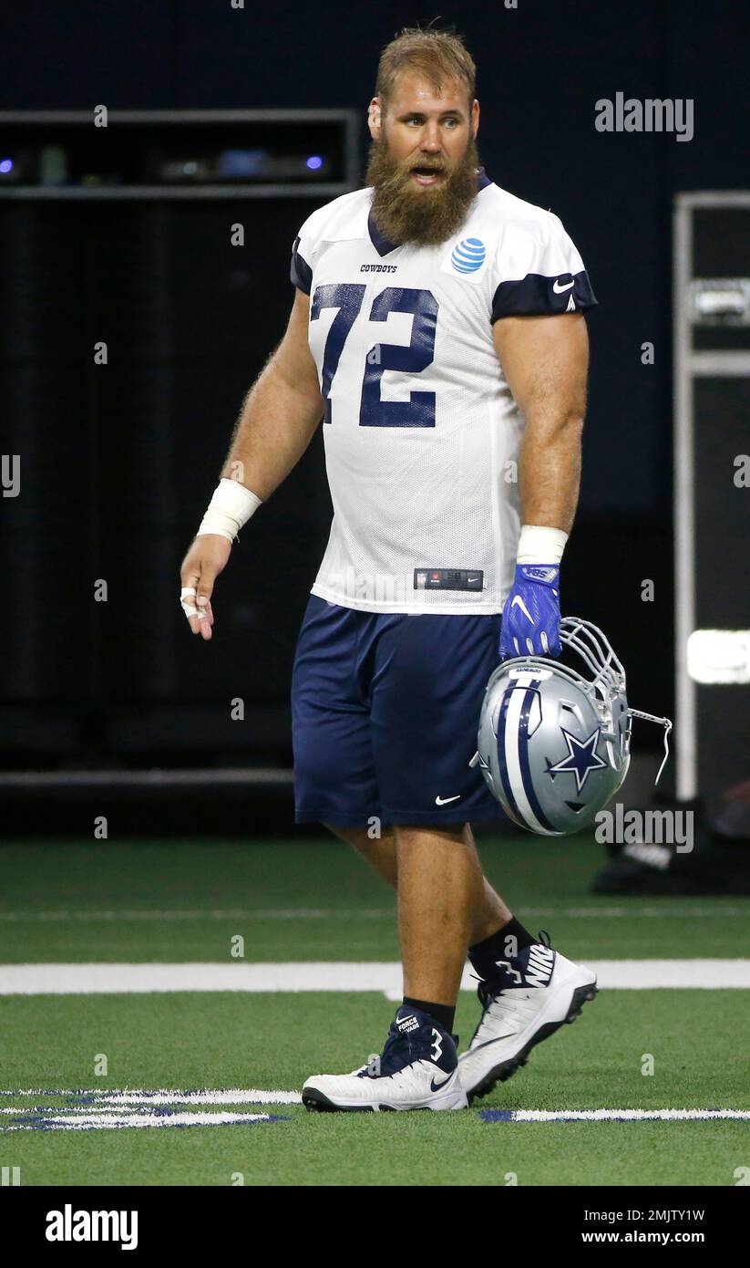 Dallas Cowboys center Travis Frederick (72) looks on during an ...