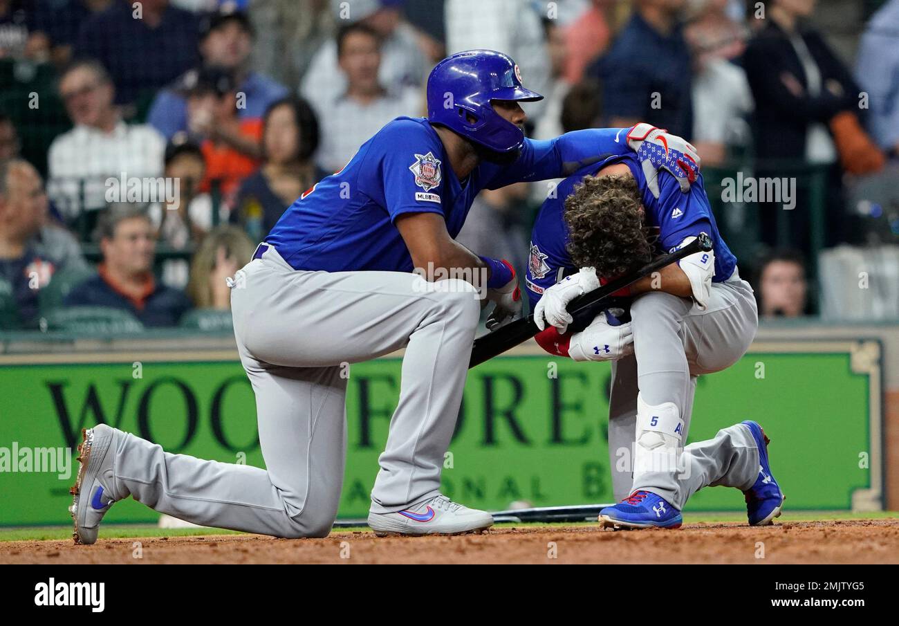 Chicago Cubs' Albert Almora Jr., right, is comforted by Jason Heyward ...