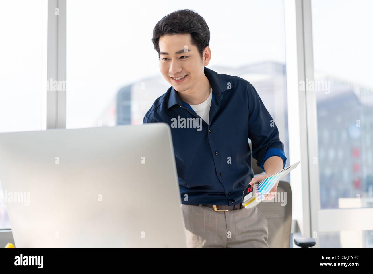 A young business man work in the office Stock Photo - Alamy