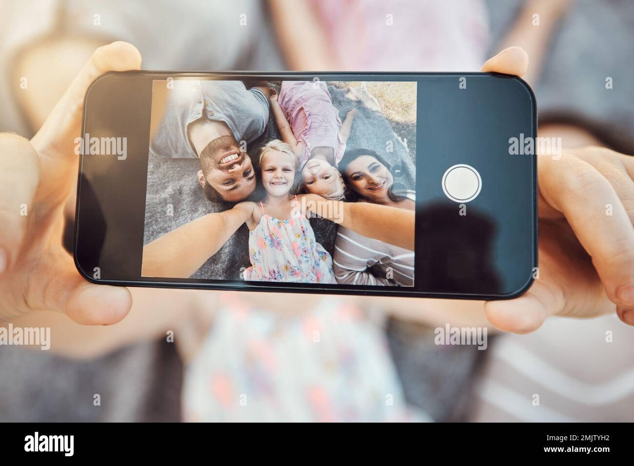 Phone screen, hands and family selfie portrait of hand with mobile zoom ...