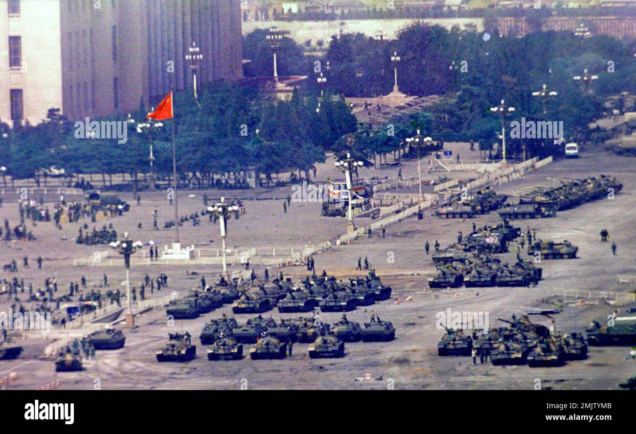FILE - In this June 5, 1989 file photo, Chinese troops and tanks gather ...