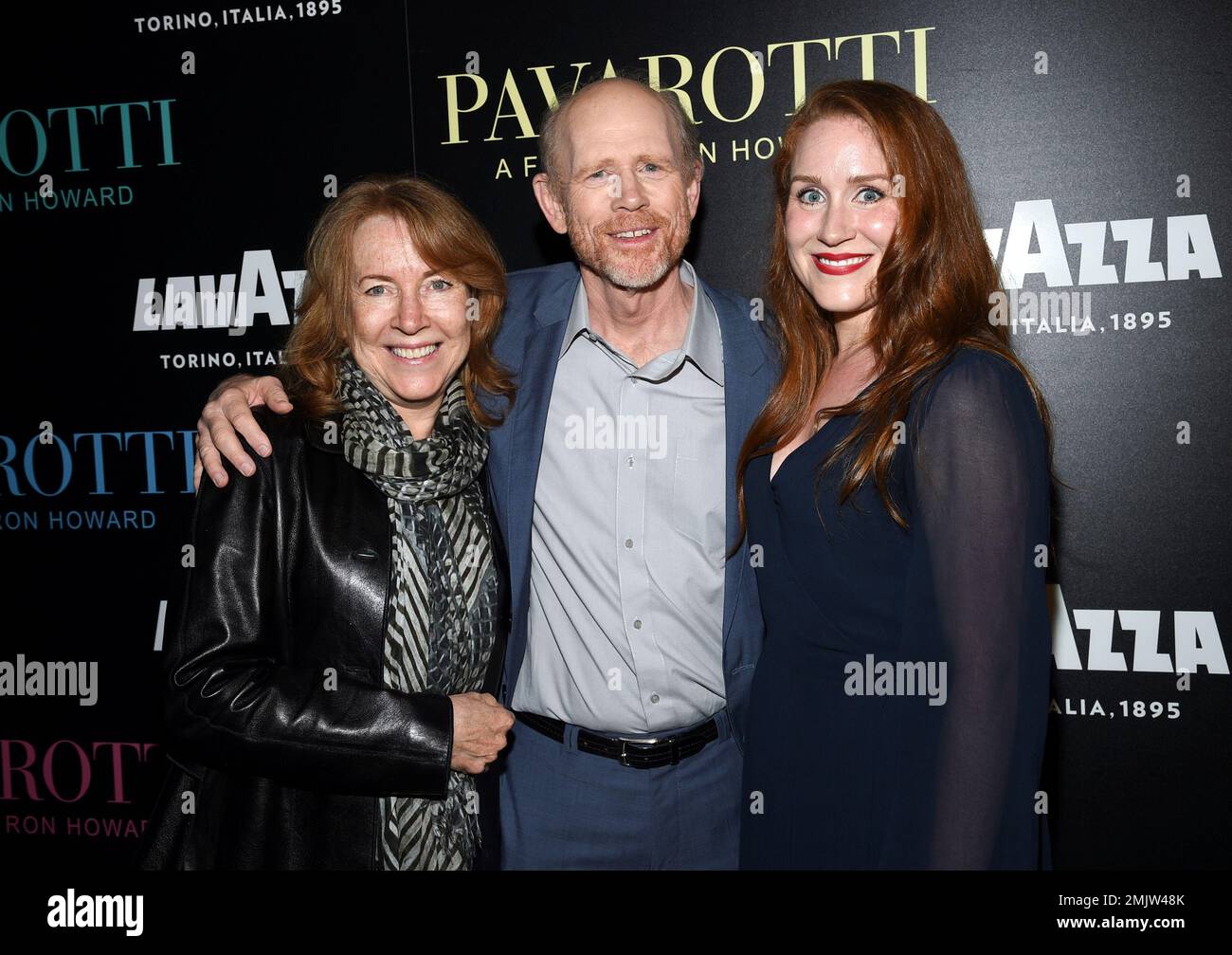 Director Ron Howard, center, poses with wife Cheryl Howard, left, and ...