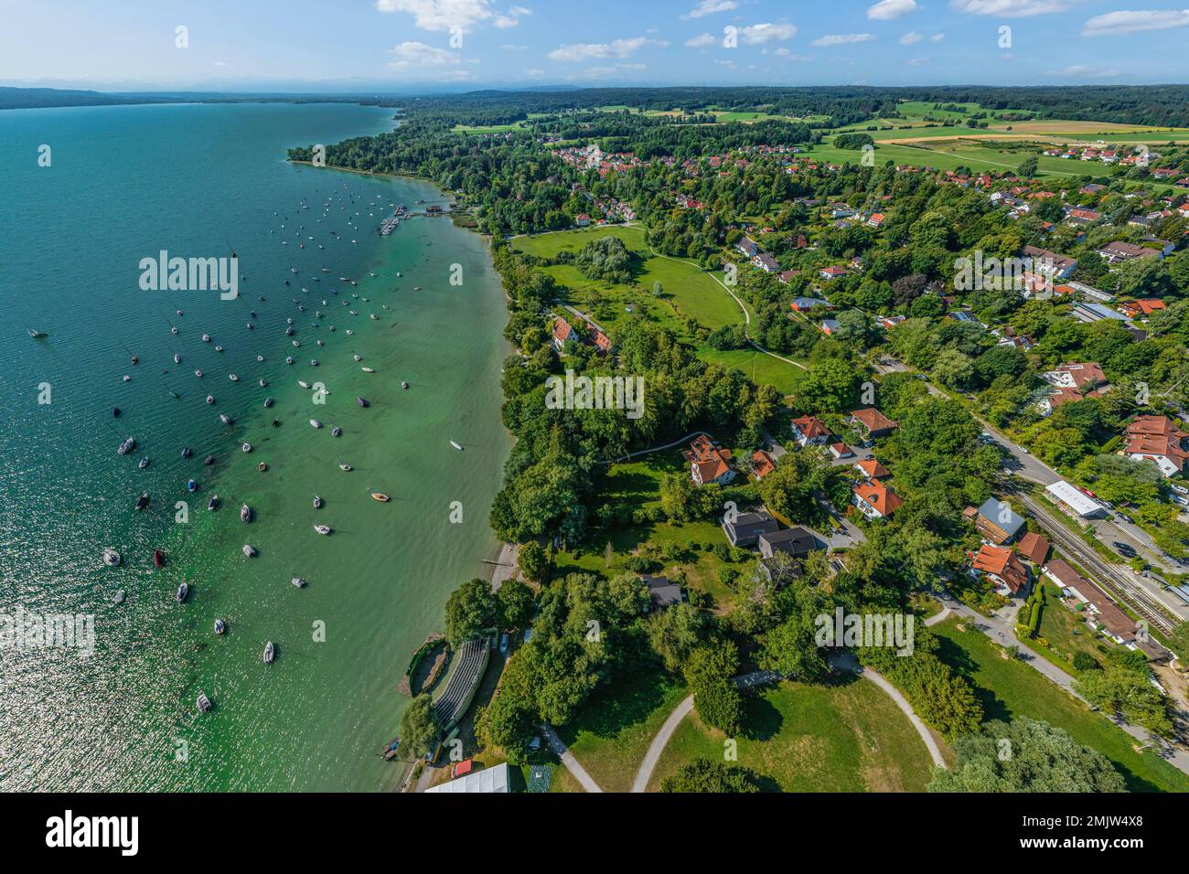 Aerial view to the idyllic bavarian region around Utting on Ammersee in ...